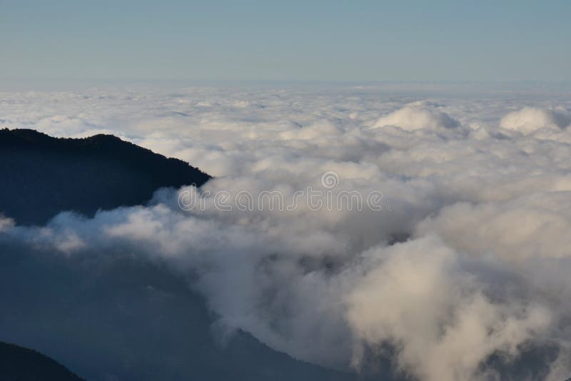 Mountain mist and clouds stock photo. Image of color - 241087906