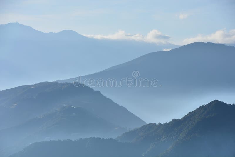 Mountain mist and clouds stock photo. Image of wind - 117915978