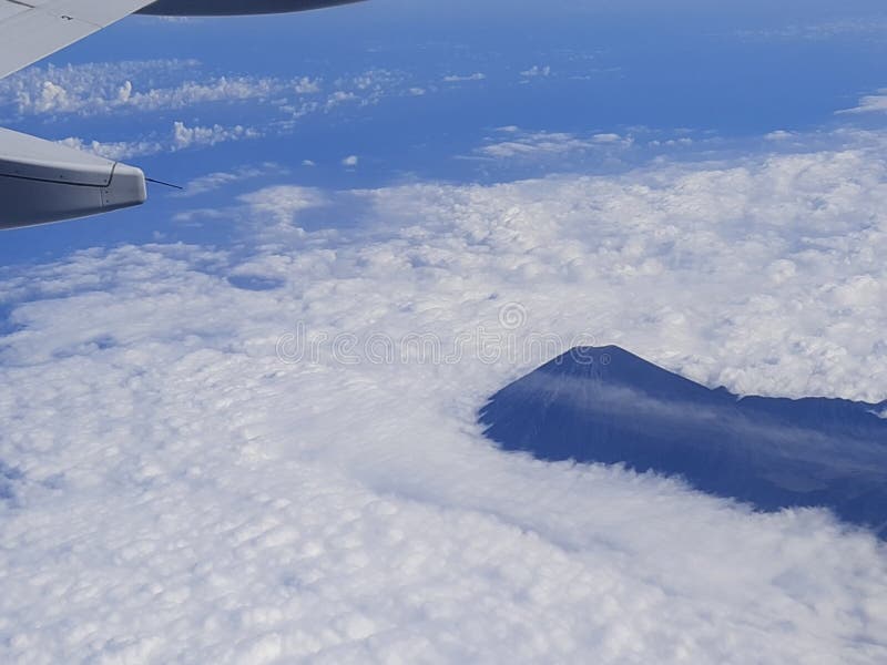 Mountain om cloud stock photo. Image of snow, blue, freezing - 210153772