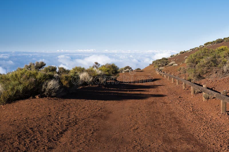 Mountain Path Above the Clouds Stock Image - Image of canary, rock ...