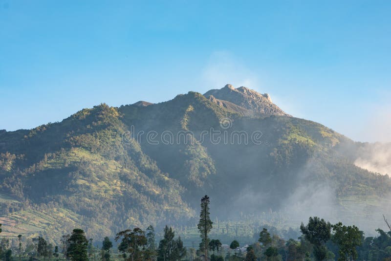Volcano Peak Rising Up into the Sky in Beautiful Morning Light Stock ...