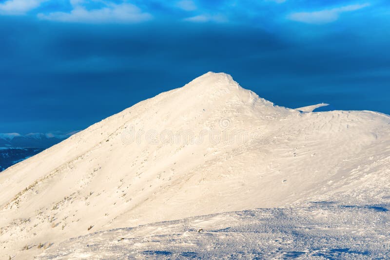 Mountain peak in snow stock image. Image of rock, nature - 135637241