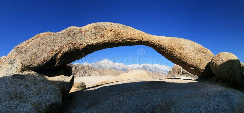 Mountain Peaks through Arch Stock Image - Image of natural, scenic ...