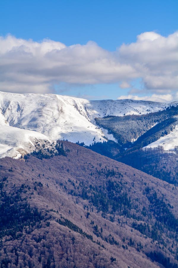 Mountain Peaks Covered with Snow. Vertical Panoramic View with H Stock ...