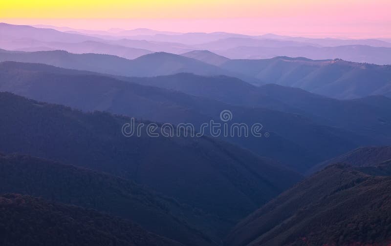 Mountain Peaks at Sunset Haze Stock Image - Image of idyllic, hill ...
