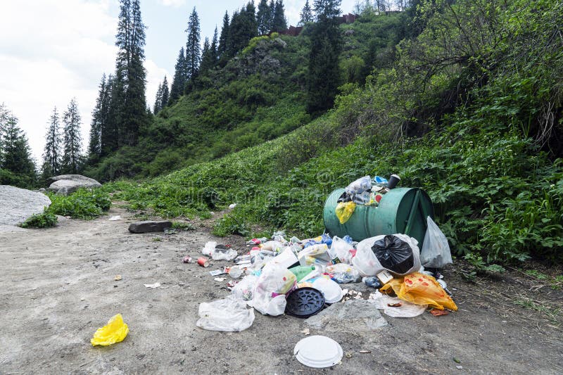 Mountain of Plastic Debris Under a Tree in Park or Forest. Pollution of ...