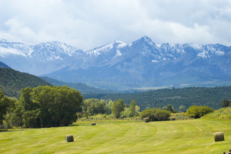 Old Rustic Mountain Cabin Ranch Under Storm Clouds Stock Image - Image ...