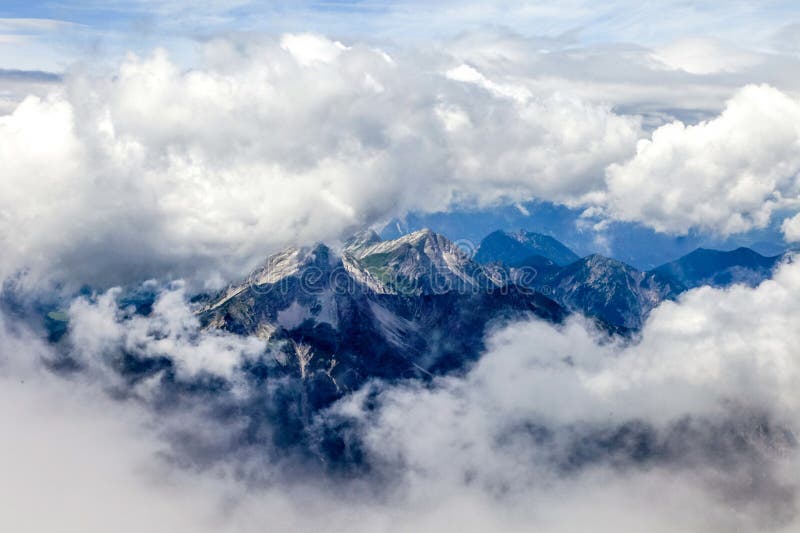 A Mountain Range with Clouds in the Sky View of the Alps from Zugspitze ...