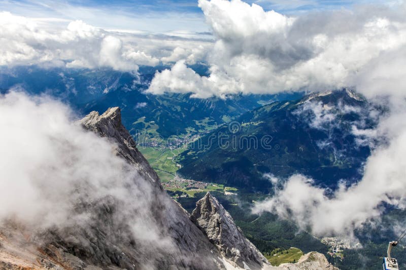 A Mountain Range with Clouds in the Sky View of the Alps from Zugspitze ...