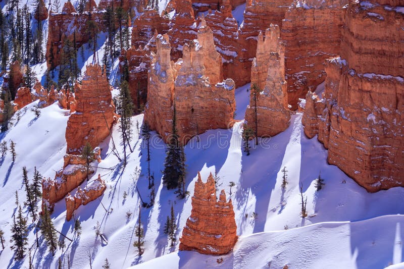 A Mountain Range Covered in Snow and Red Rocks Stock Image - Image of ...