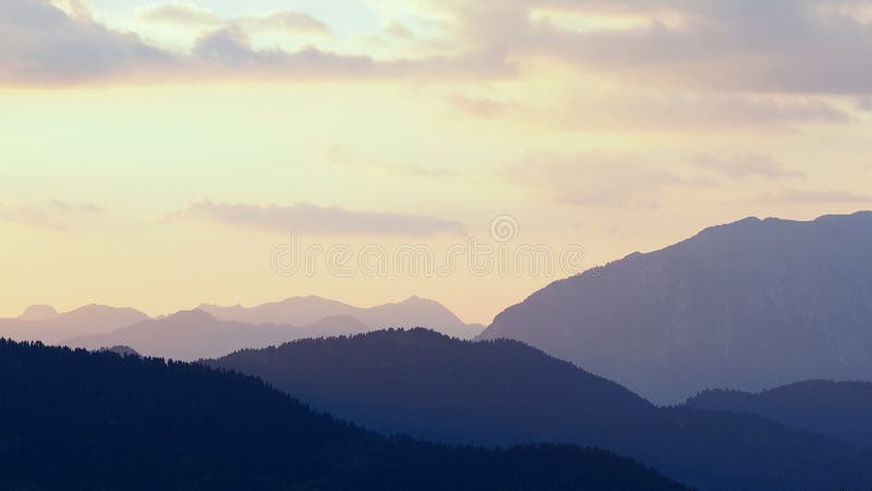 Mountain Range at Dusk stock image. Image of layered - 76542723