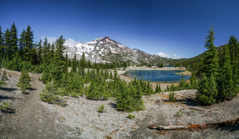 A Mountain Range with a Lake in the Foreground Stock Image - Image of ...