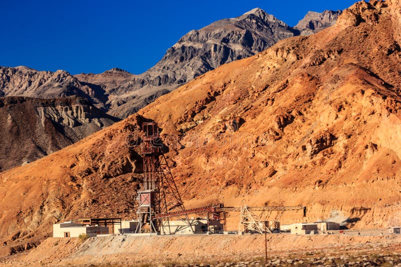 A Mountain Range with a Large Building in the Foreground Editorial ...