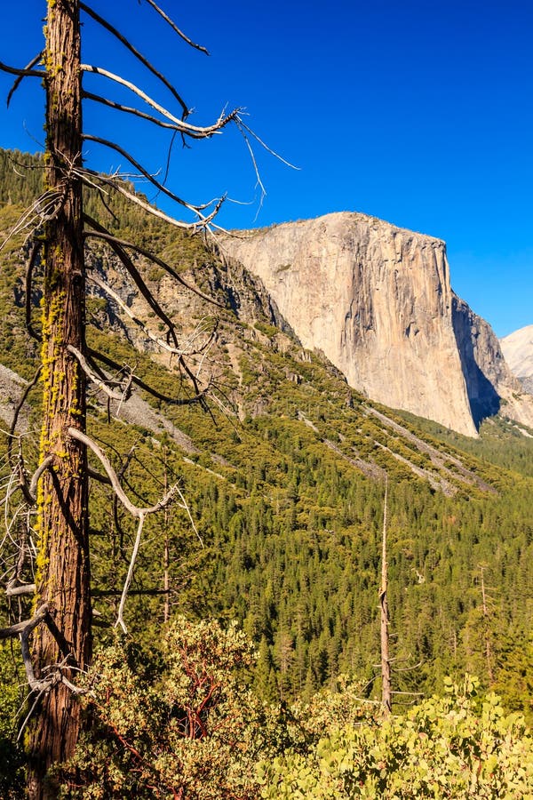 A Mountain Range with a Large Cliff in the Distance Stock Image - Image ...