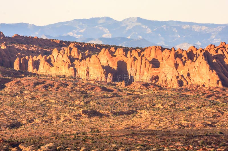 A Mountain Range with a Large Rock Formation in the Foreground Stock ...