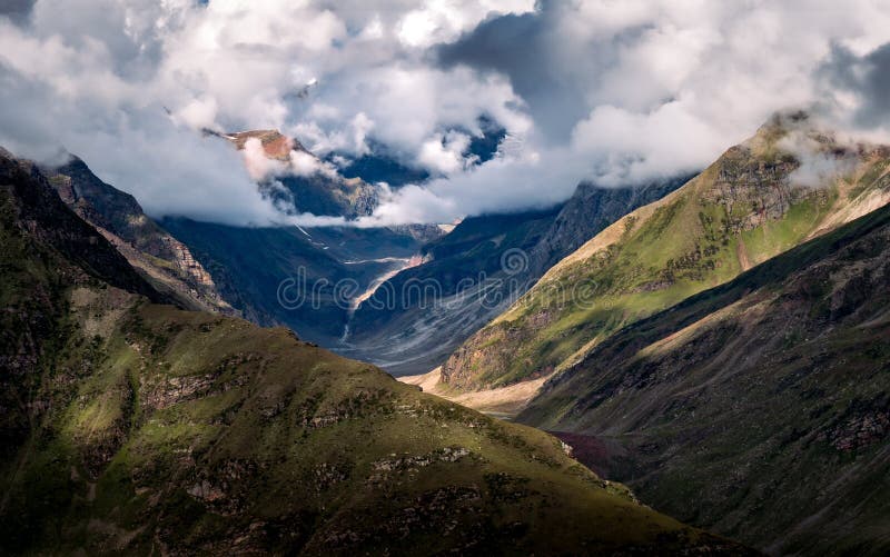 Mountain Range with Low Clouds and Dramatic Sky, India Stock Image ...