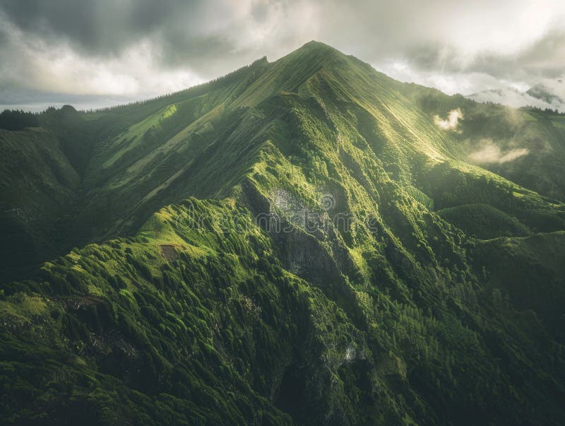 A Mountain Range with a Lush Green Hillside Stock Photo - Image of ...