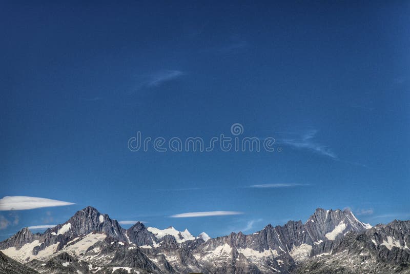 Mountain Range Under a Clear Blue Sky Stock Photo - Image of room ...