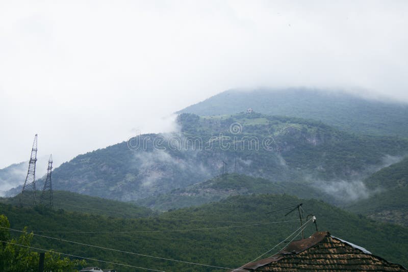 Mountain Ranges Covered with Forest Under the Clouds Stock Photo ...