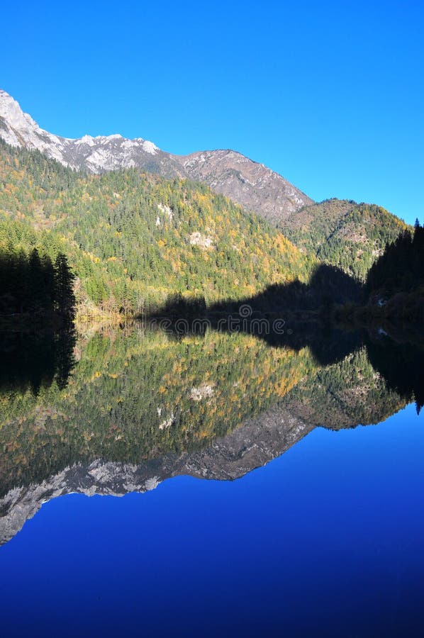 Mountain with Reflection on a Lake during Autumn Stock Image - Image of ...