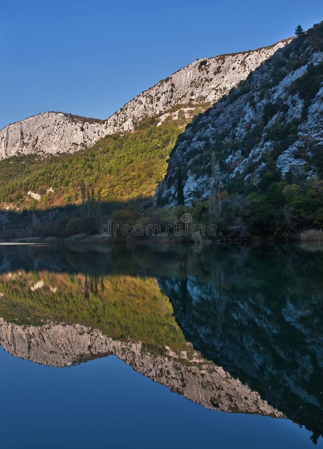 Mountain Reflection in Water Stock Image - Image of color, gleaming ...