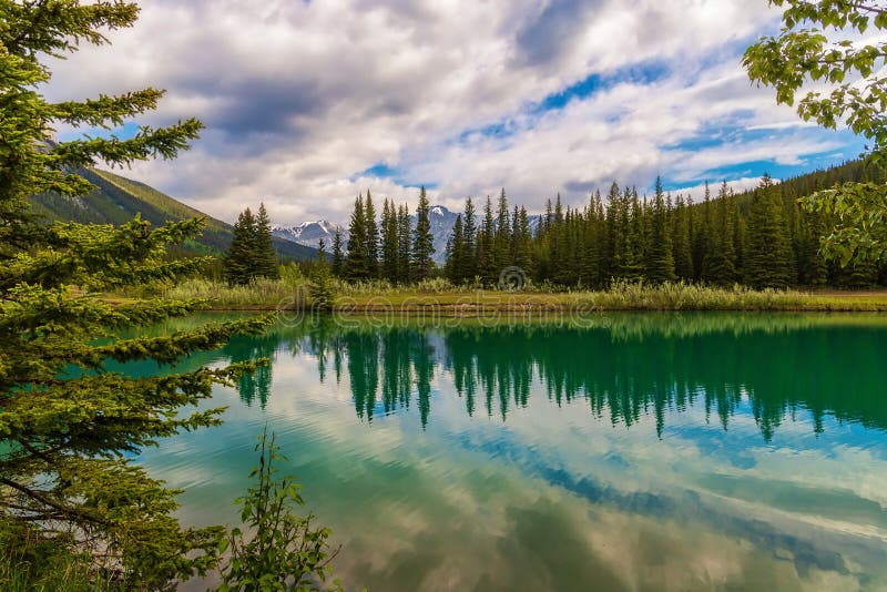 Mountain Reflections at Cascade Ponds Stock Photo - Image of ponds ...