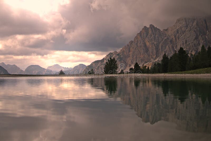 Mountain Reflections in a Lake Stock Image - Image of scenic, evening ...