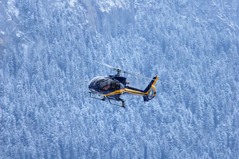 Mountain Rescue Helicopters Above Alps, Kitzbuhel, Austria Stock Image ...