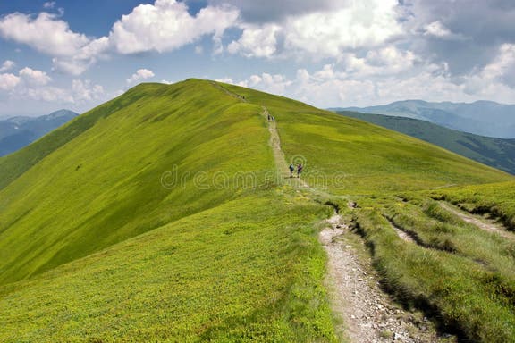 Mountain Ridge with Cloudy Skies in the Summer Stock Photo - Image of ...
