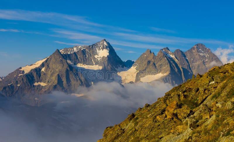 Mountain Ridge in Mist and Clouds Stock Photo - Image of mountain ...