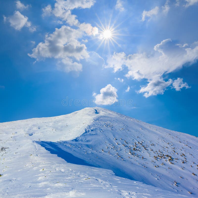 Mountain in Snow Under a Sparkle Sun Stock Image - Image of glow ...