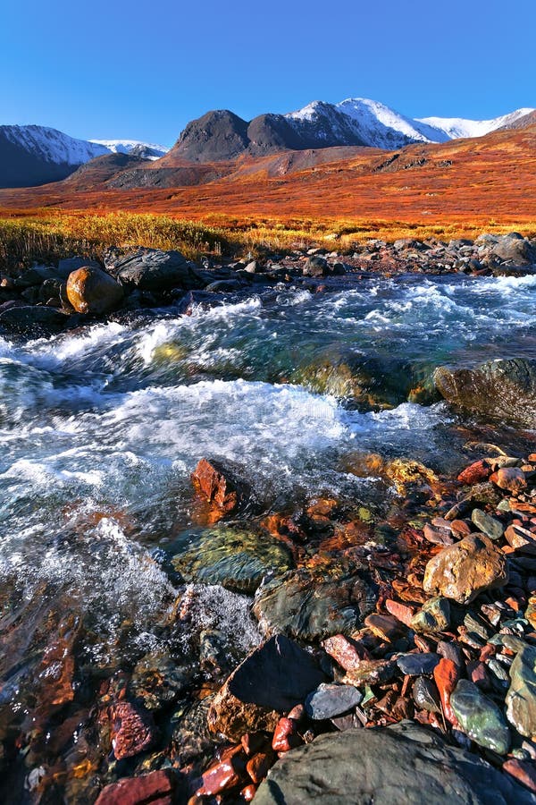 Mountain River on a Background of Mountain Peaks. Stock Photo - Image ...