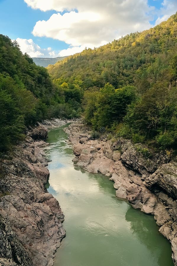 Mountain River at the Bottom of a Deep Gorge in the Mountains Stock ...