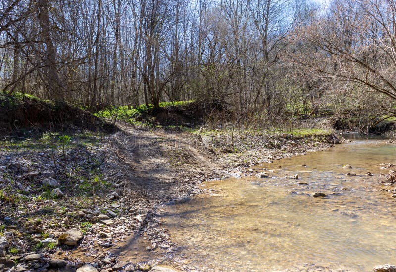 Mountain River, Spring Day Walks Along the Riverbed of a Water Barrier ...