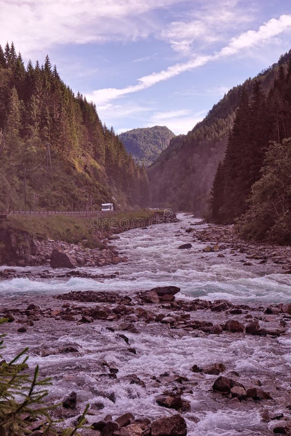 Mountain River Surrounded by Forests and Mountains Near the Motorway ...