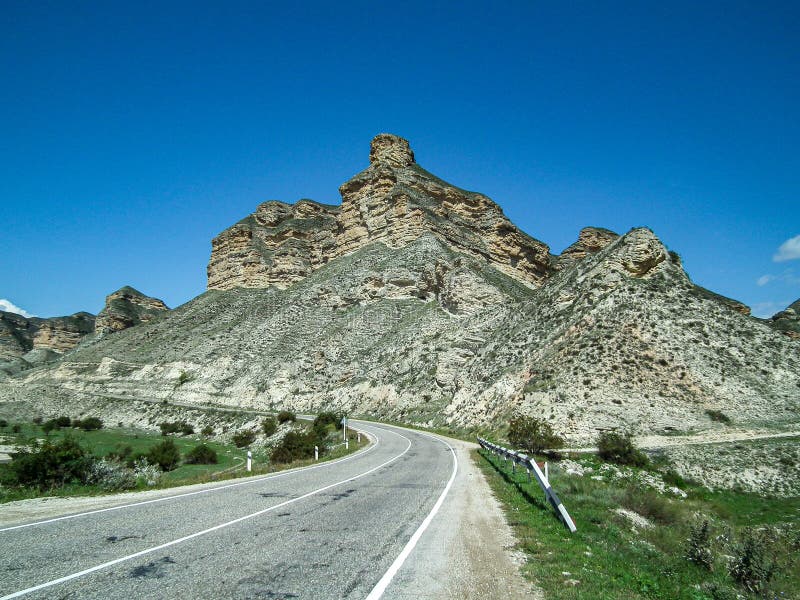 Mountain Road in Deep Canyon between Two Cliffs Under Blue Sky Stock ...