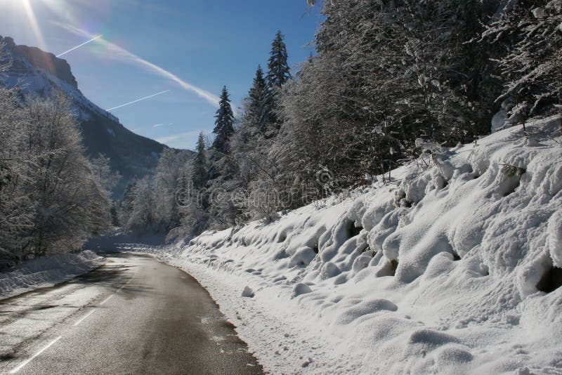 Mountain road snow-covered stock photo. Image of snow - 3276212