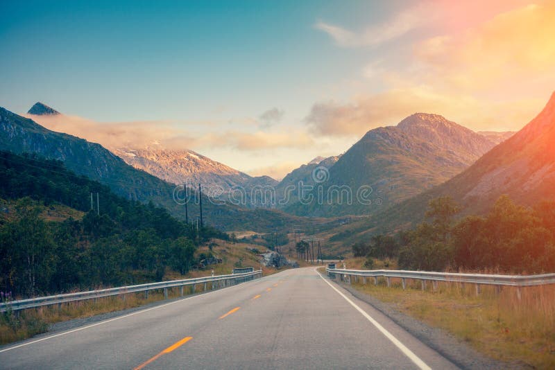 Mountain road at sunset stock photo. Image of journey - 82730246