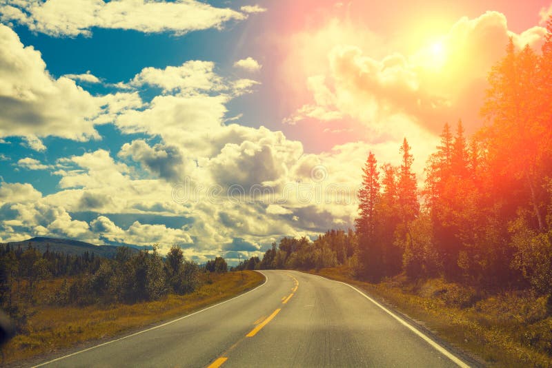 Mountain road at sunset stock image. Image of north - 109009383