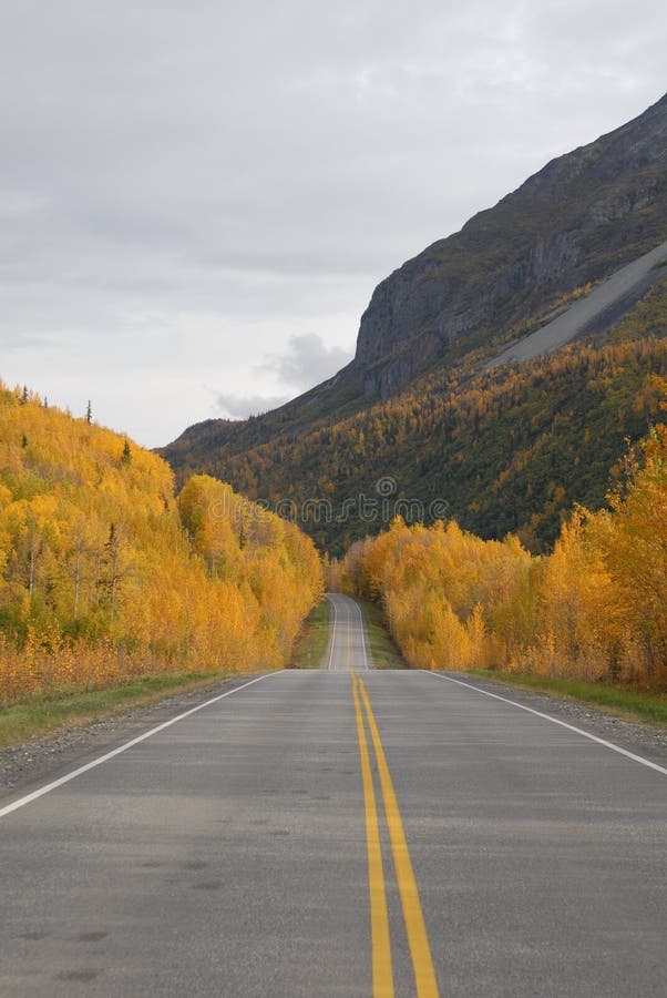 A mountain road to fall stock photo. Image of paved - 137320940