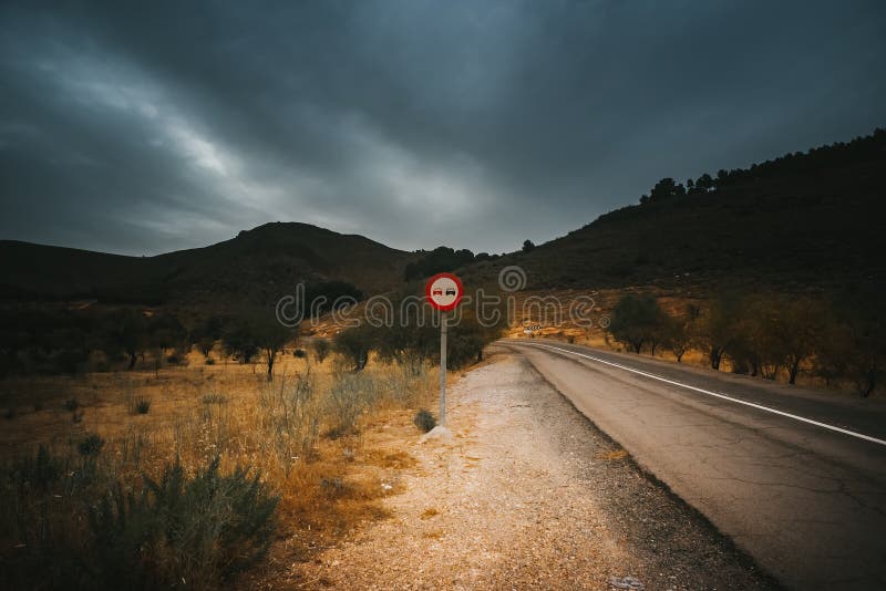 Mountain Road Traffic Sign on a Curve Stock Photo - Image of safety ...