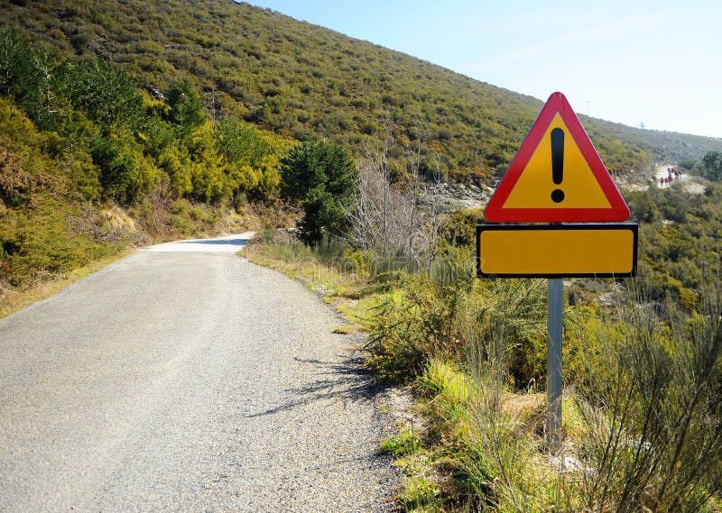 Mountain Road with Traffic Sign Warning of Danger Stock Photo - Image ...