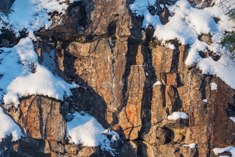 Mountain Rock Under the Snow Stock Photo - Image of mountain, cliff ...