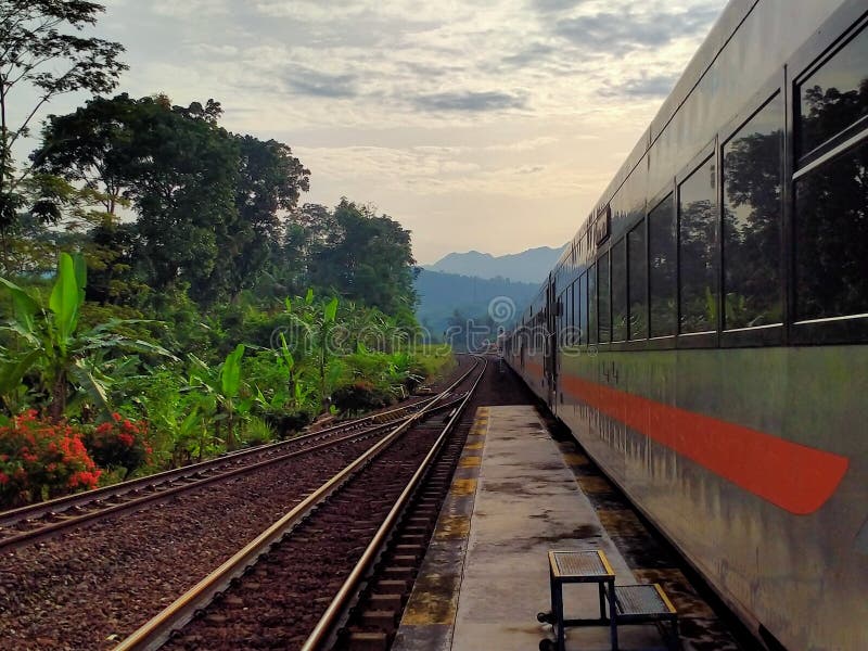 Mountain Rural Train Station with Train on Platform Stock Photo - Image ...