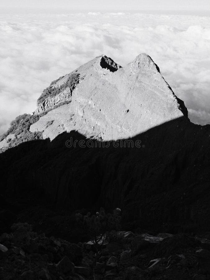 A Mountain with a Shadow on it Stock Image - Image of climb, alpine ...