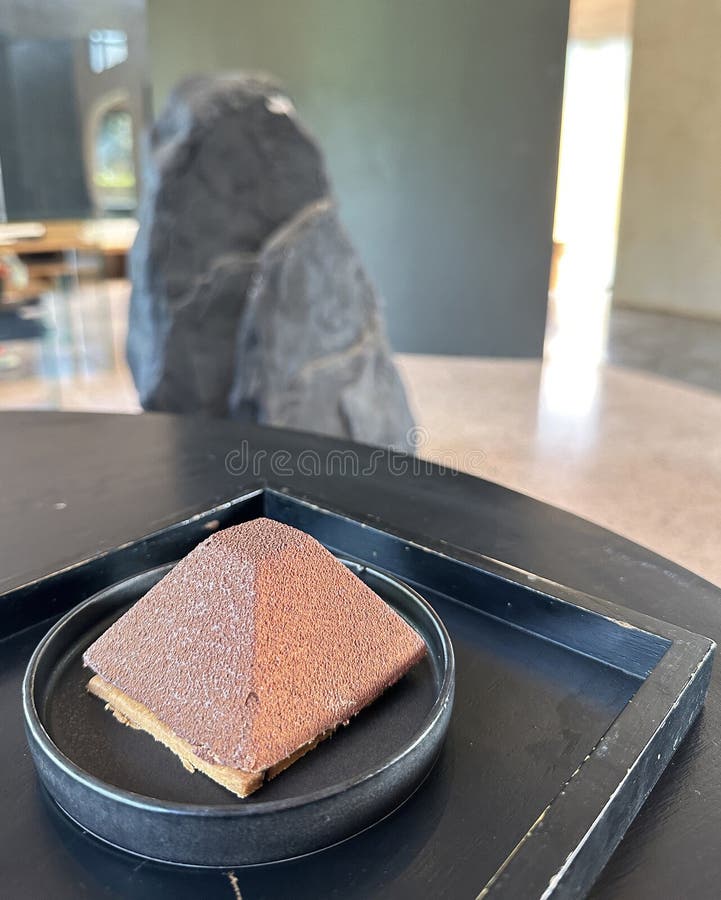 A Mountain-shaped Chocolate Cake with Almonds at Its Base Stock Image ...