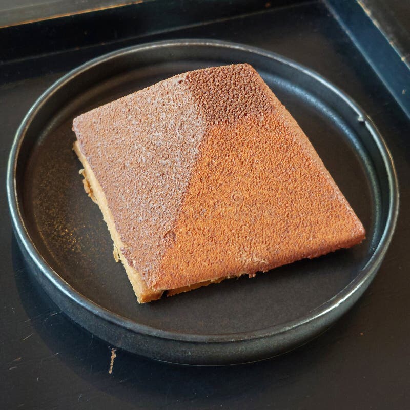 A Mountain-shaped Chocolate Cake with Almonds at Its Base Stock Image ...