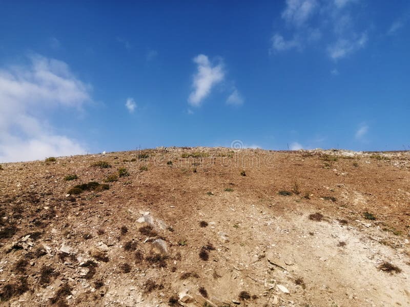 Mountain slope and sky stock photo. Image of plain, mountain - 219844344