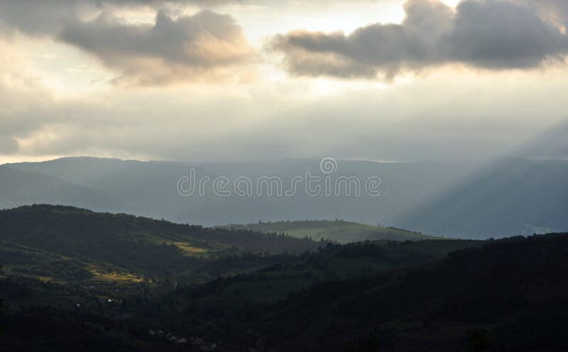 Mountain Slope View, Sun Rays and Mountains at Sunset Stock Image ...