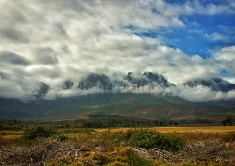 Mountain storm clouds stock image. Image of lourensford - 54844841